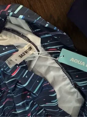 Swim | Navy Blouson Tankini With Multicolor Streak Print | Poshmark